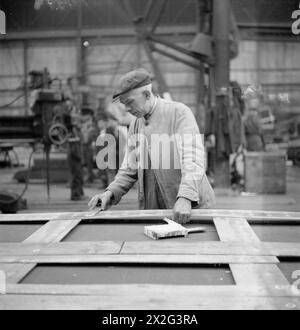 A 1943 photograph by Cecil Beaton of a ship's keel in a slipway at Tyne ...