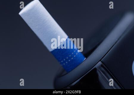 Modern cigarette without burning tobacco, close-up. Heated tobacco ...