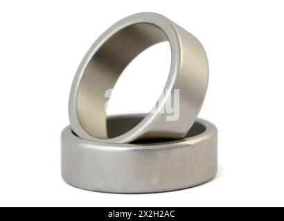 Two rings of porous silvery metal with arabic ligature isolated on ...