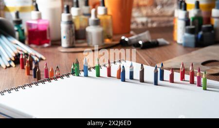 colored pencils on white paper with drawn hearts Stock Photo - Alamy