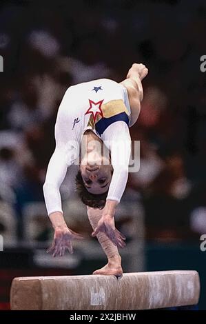Kerri Strug (USA) competing on the the balance beam in the women's ...