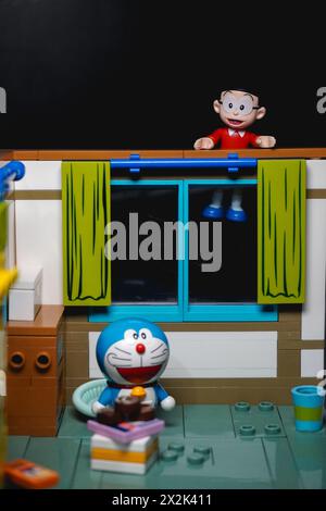 The figure of Nobita peeking at Doraemon from outside the window Stock ...