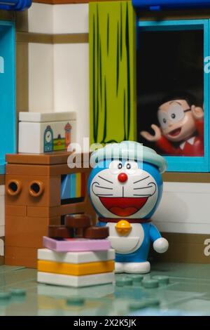 The figure of Nobita peeking at Doraemon from outside the window Stock ...