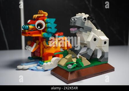 Lego in the form of a dragon and a sheep representing the zodiac signs ...