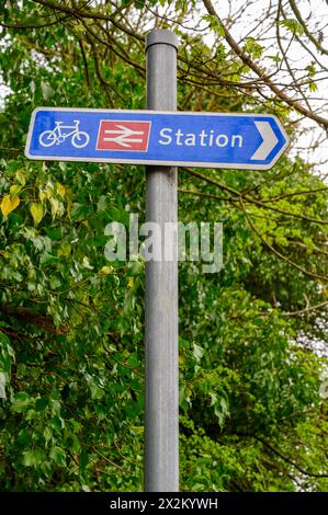 Signpost with directional sign for cyclists showing cycle path to the ...
