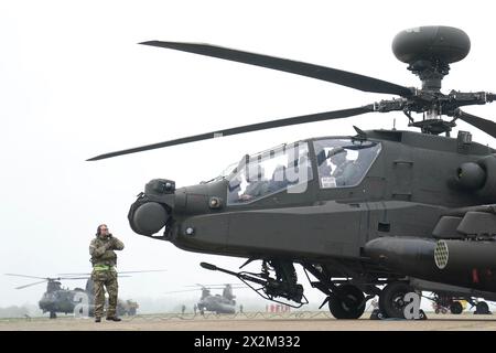 British Army Apache AH-64E attack helicopters are prepared for take off ...