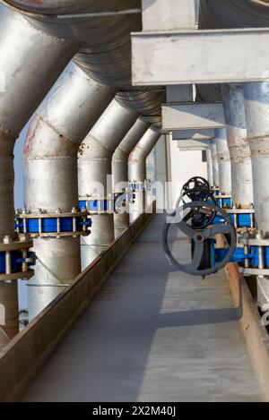 Huge industrial pipes and valves in an industrial factory Stock Photo ...