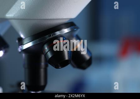 One microscope on blurred background, closeup view Stock Photo - Alamy