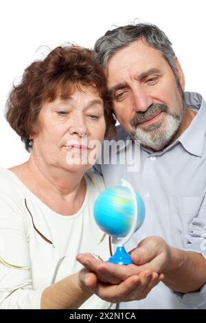 Small Earth model with human hands. Abstract composition of peace Stock ...