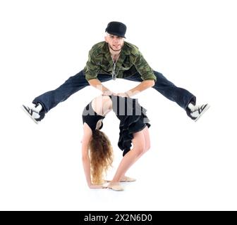 Gymnast does bridge and rapper jump above her and tries to lift her ...