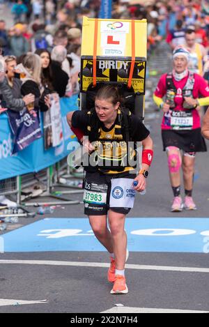 Laura Bird competing in the TCS London Marathon 2024 passing through ...