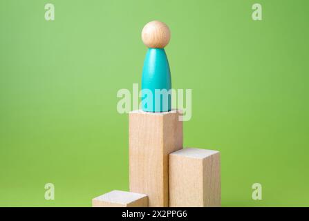 Man on a pedestal. Reach heights. Career success. Loneliness. Education ...