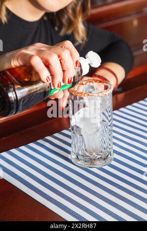 Preparing to taste a delicious bloody mary, to cool off in this hot ...