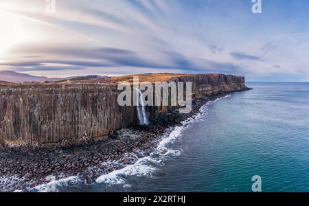Aerial view of kilt rock waterfall cascading from a dramatic cliff into ...