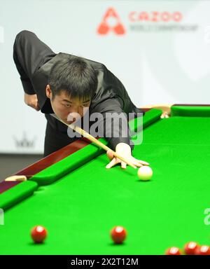 Pang Junxu plays a shot during his match against Robert Milkins on day ...