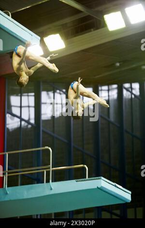 MOSCOW - APR 13: Athletes perform exercise during competitions on ...