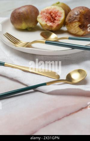Table setting with stylish dishware on beige tablecloth Stock Photo - Alamy