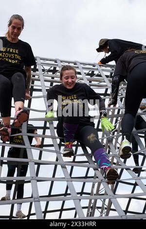 Ukrainian women climbing the "A-Frame" obstacle at the Spartan Race ...