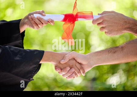 Giving, diploma and people handshake in graduation success ...