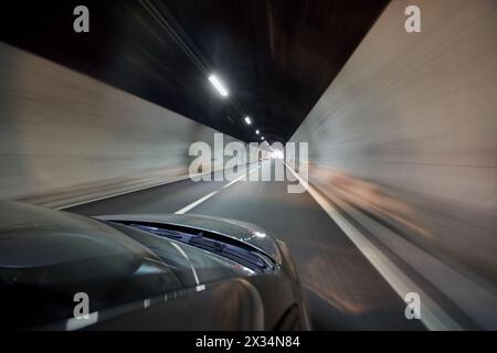 View at illuminated tunnel from right side of moving car Stock Photo ...