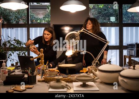 Eleni Aloupi-Siotis, founder, and her colleagues carefully study the ...