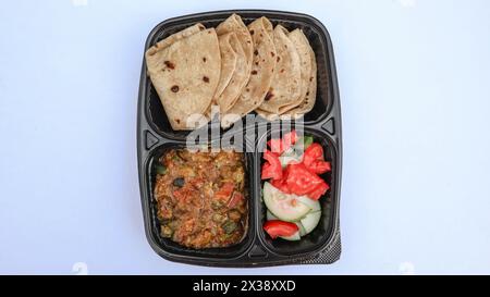 Simple and tasty Indian lunch box consisting of roti ans sabji. Sabzi ...