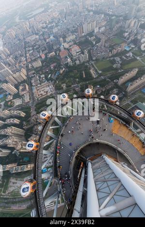 GUANGZHOU, CHINA - AUG 21, 2015: People on observation deck of Canton ...