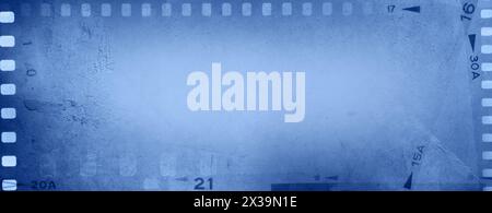 Film negatives frames blue background Stock Photo - Alamy