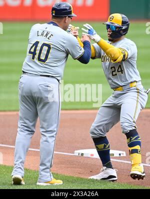 Milwaukee Brewers third base coach Ed Sedar looks back as Ryan Braun ...