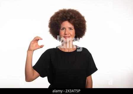 Interpreter of the Brazilian sign language, Libras, making the letter B ...