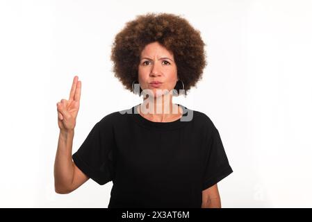 Female interpreter of the Brazilian sign language, Libras, making the ...