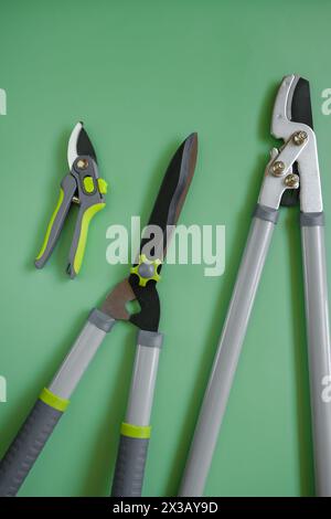 tools for topiary cutting of plants. Secateurs, loppers, and hedge ...