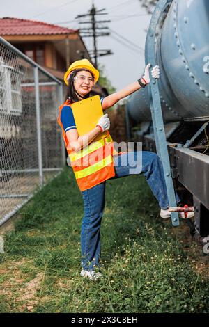 portrait train locomotive engineer women worker. Happy Asian young teen ...