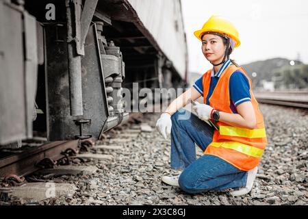 portrait train locomotive engineer women worker. Happy Asian young teen ...
