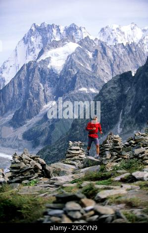A man trail runs in Chamonix, France Stock Photo - Alamy