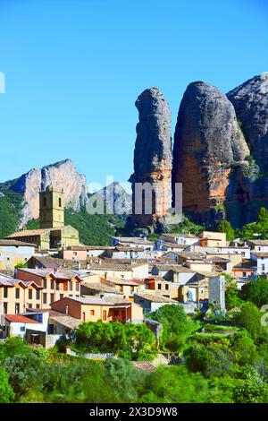 Rock formations Mallos of the Riglos at the village of Las Penas de ...