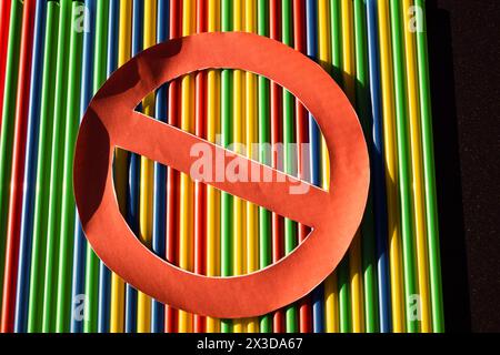 colorful plastic straws with probibition sign Stock Photo - Alamy