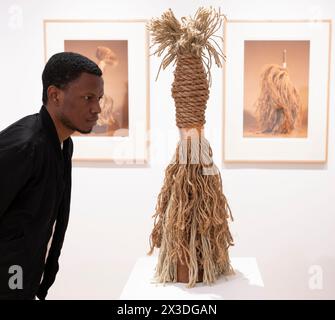 London, UK. 8 October 2024. Staff at the unveiling of ‘Open Wound’ by ...