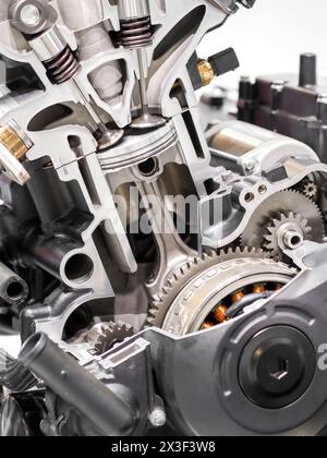 Inside view of engine section, close up detail of piston in cylinder ...