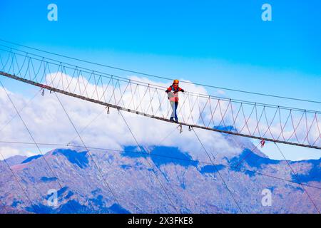 Suspension bridge at Rose Peak mountain station in Sochi resort city in ...