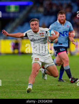 Cortez Ratima of the Chiefs makes a break to score a try during the ...