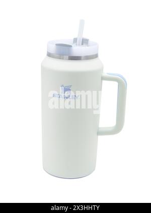 Blue insulated stainless steel tumbler with straw and handle isolated ...