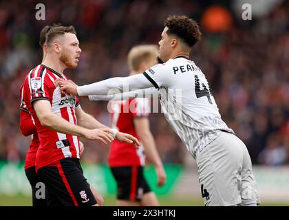 Lincoln City's Ben House (left) celebrates with Freddie Draper after ...
