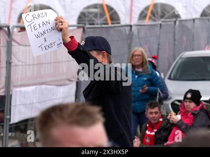 A Wrexham fan before the Sky Bet Championship match at SToK Racecourse ...
