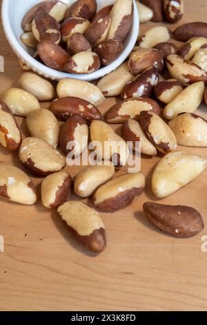 brazil nuts on wood background Stock Photo - Alamy