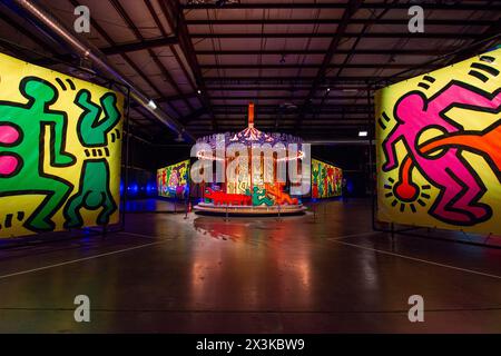 Industrially fabricated tarps and a painted carousel by Keith Haring ...