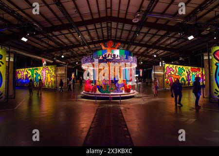 Industrially fabricated tarps and a painted carousel by Keith Haring ...