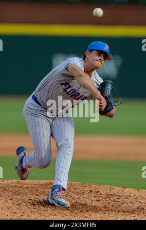 April 27, 2024: Jake Clemente #20 Florida pitcher begins his wind up on ...