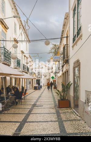Tavira, Portugal, January 8, 2024. A cobblestone street in Tavira ...