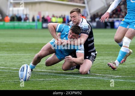 Newcastle Falcon's Brett Connon, is tackled during the Premiership Cup ...